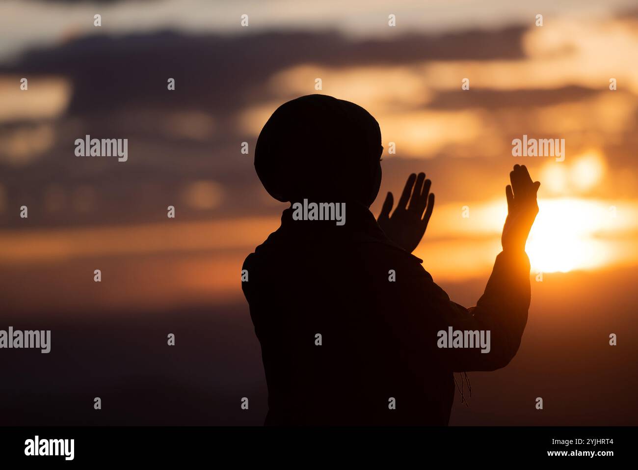 Muslim woman prayer having worship and praying with hands open doing ...