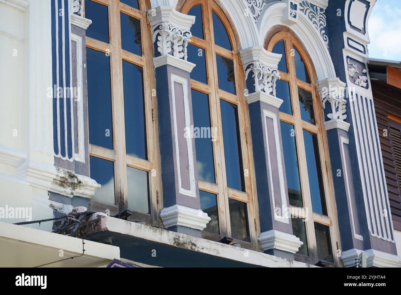 Detailed view of windows, doors and balconies of city buildings Stock ...