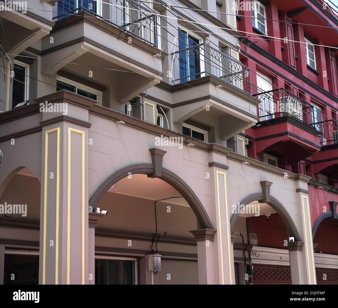Detailed view of windows, doors and balconies of city buildings Stock ...
