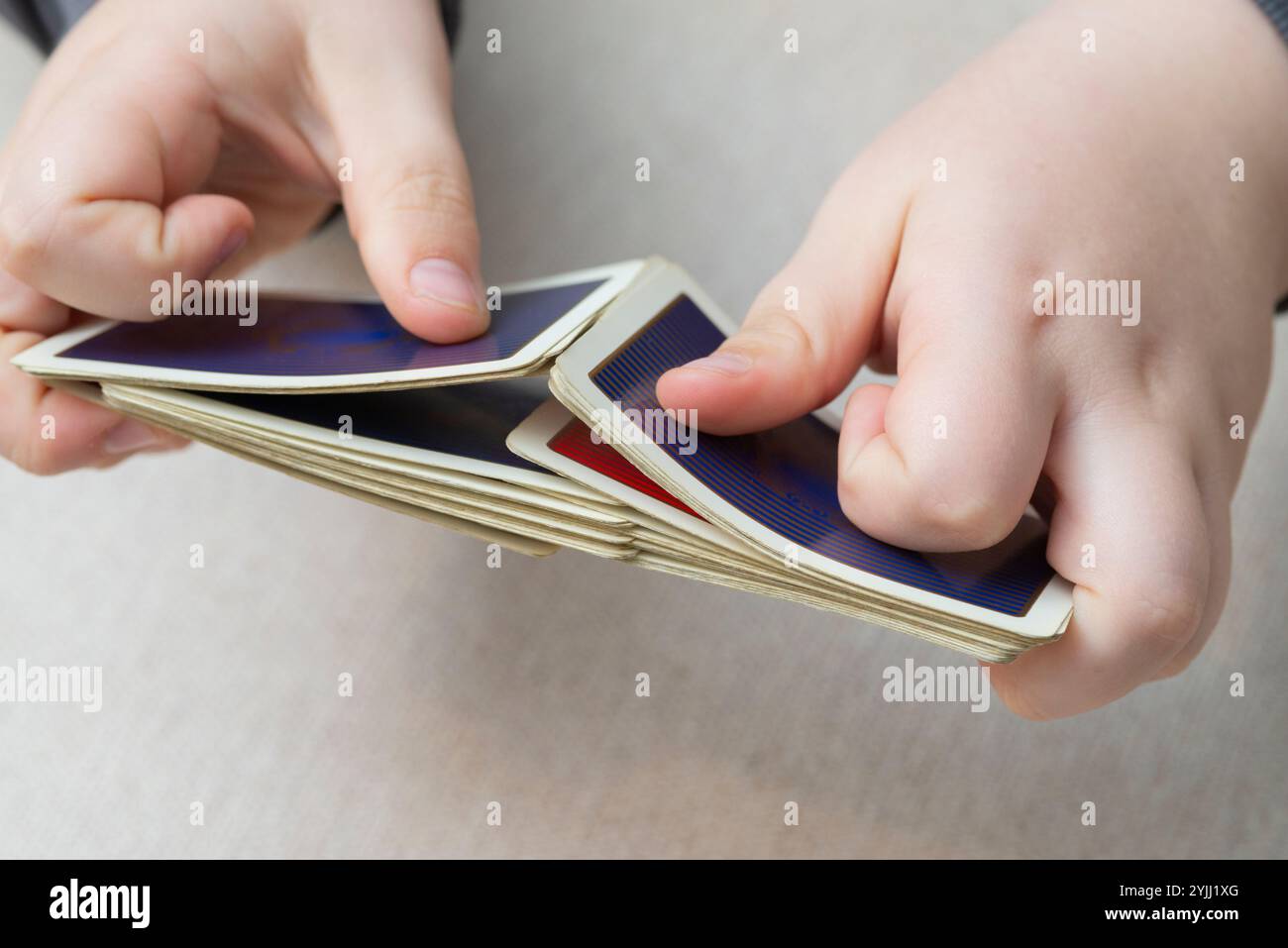 Close up hands shuffling hi-res stock photography and images - Alamy