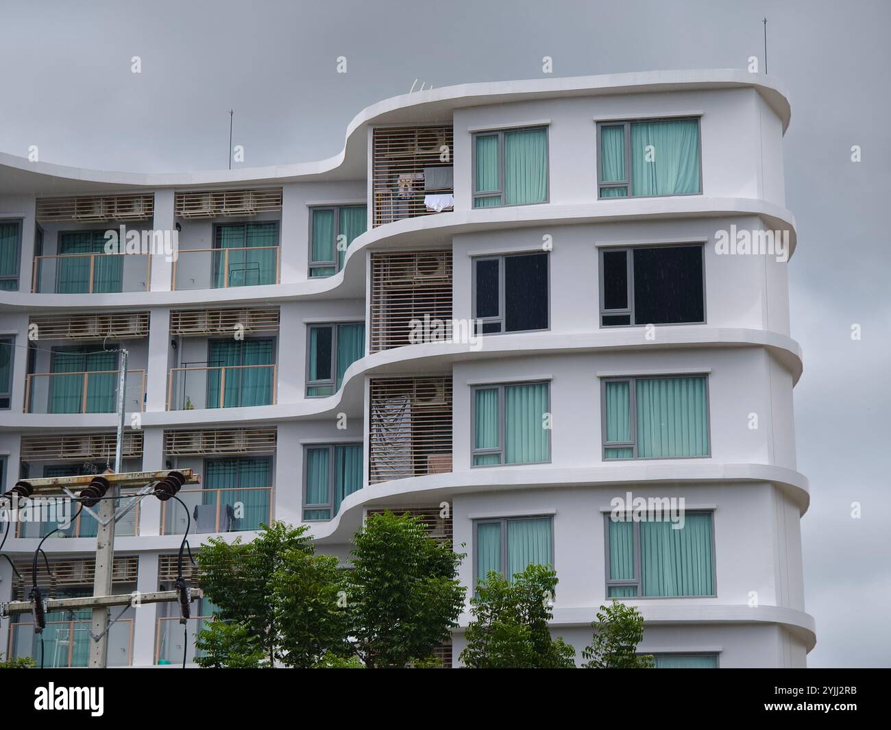 Detailed view of windows, doors and balconies of city buildings in ...