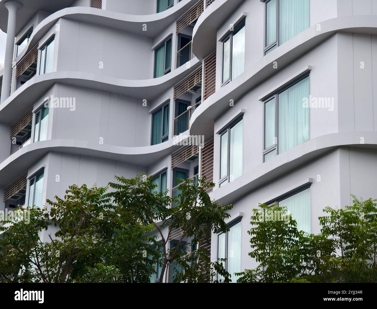 Detailed view of windows, doors and balconies of city buildings Stock ...