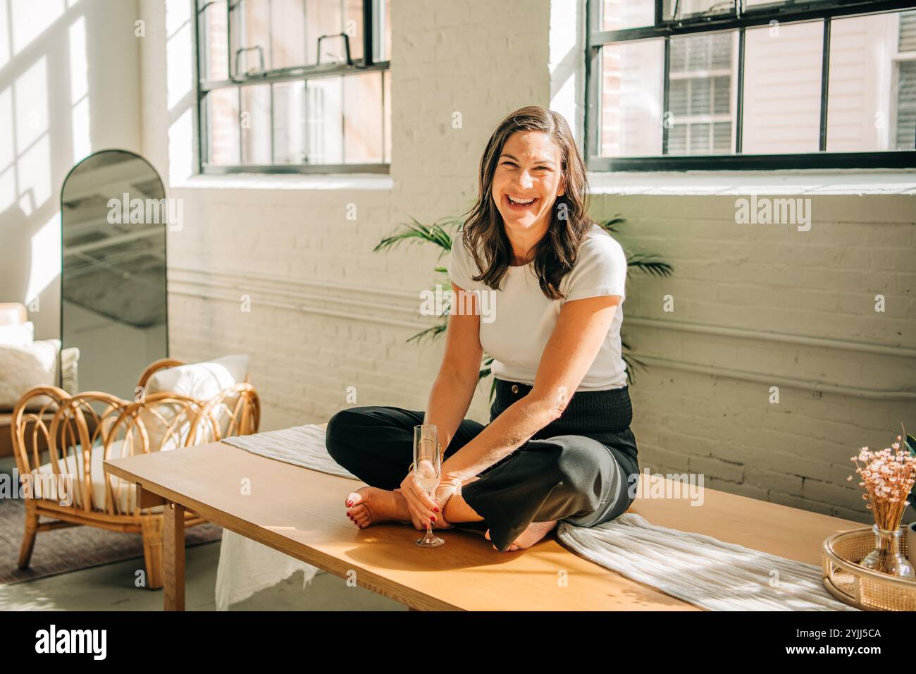 Seated woman serene expression hi-res stock photography and images - Alamy