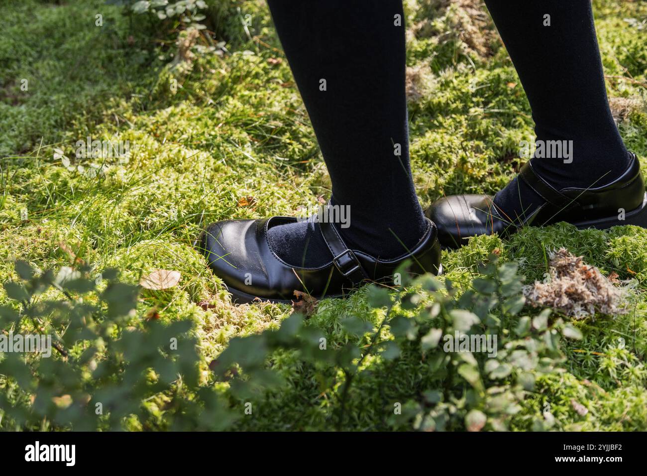 Girl stepping on hi-res stock photography and images - Alamy