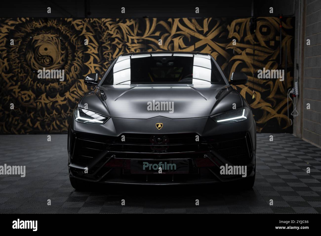 A Lamborghini Urus Performante with matte black finish is displayed ...