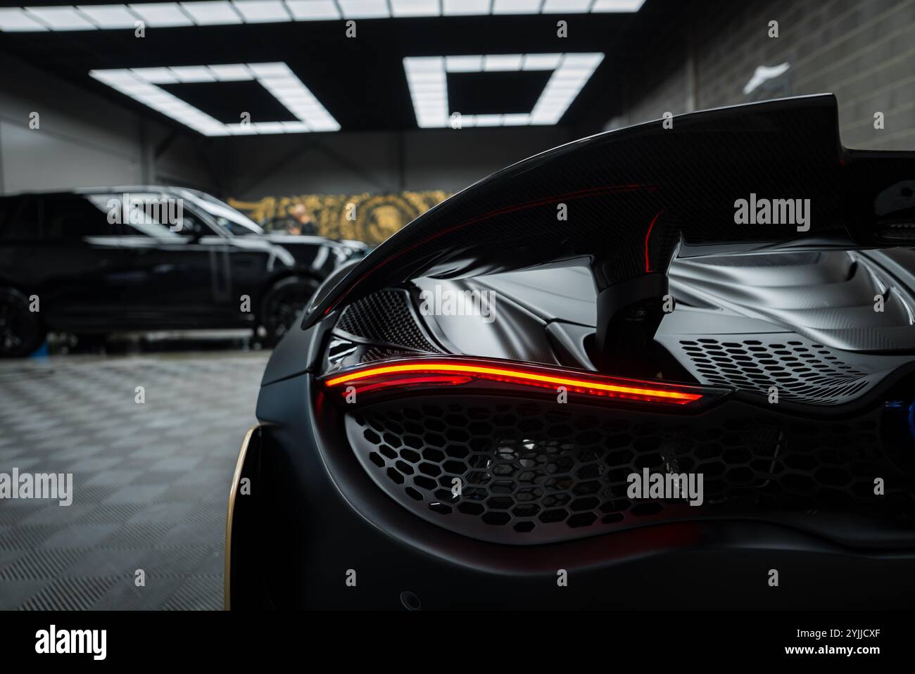 Close Up of McLaren 720S Rear in Modern Garage Setting Stock Photo - Alamy