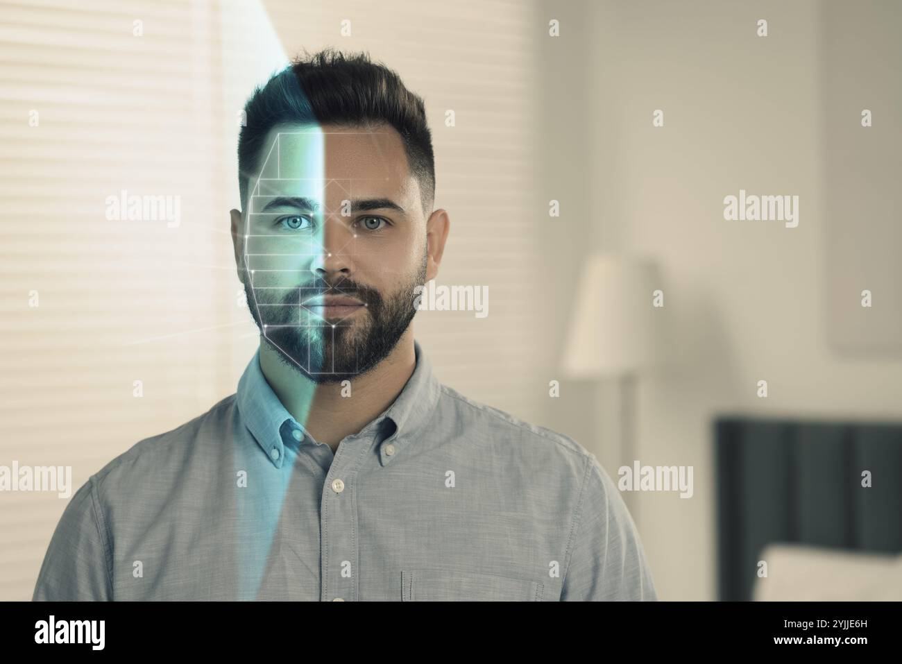 Facial recognition system. Man undergoing biometric verification at ...
