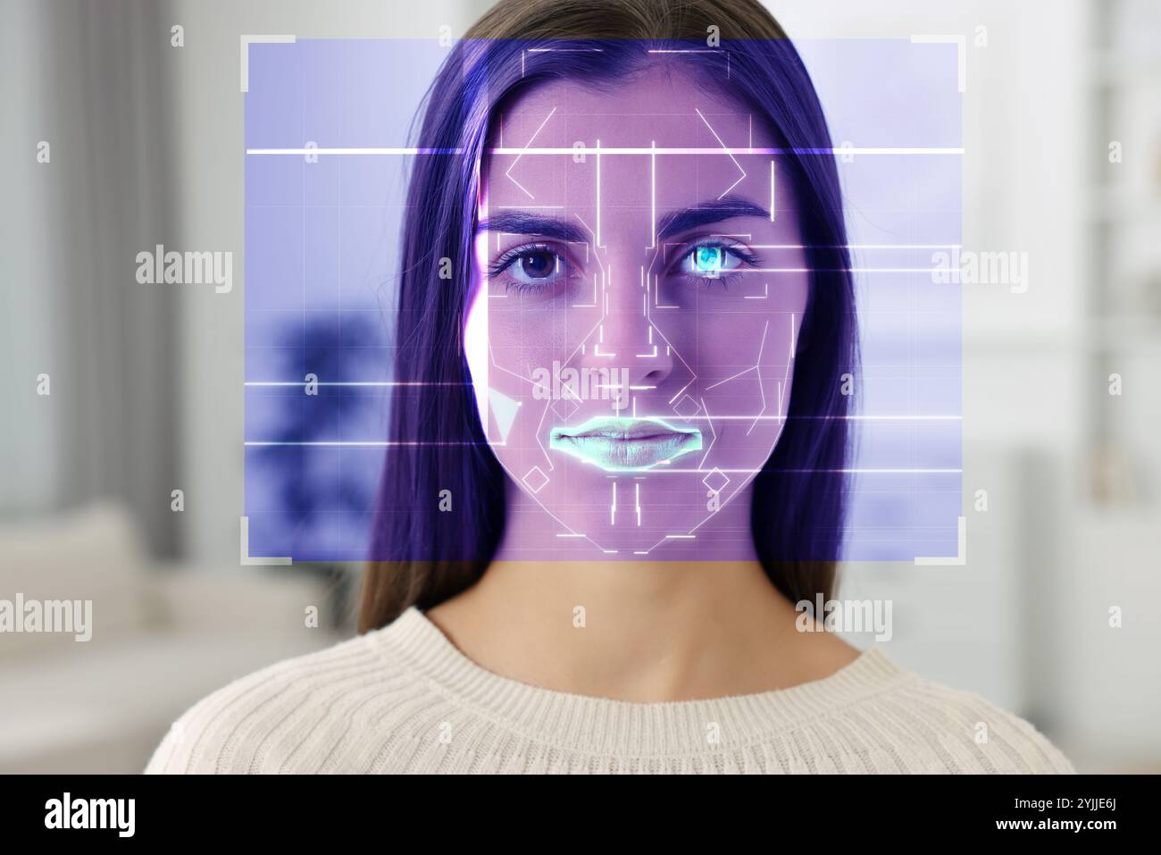 Facial and iris recognition system. Woman undergoing biometric ...