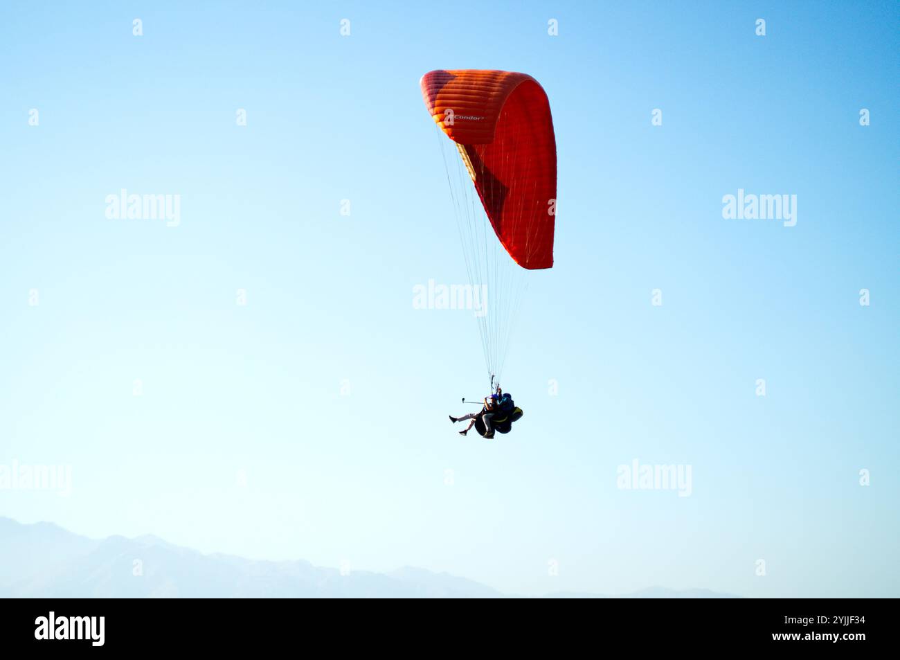 Flying With A Parachute Stock Photo - Alamy