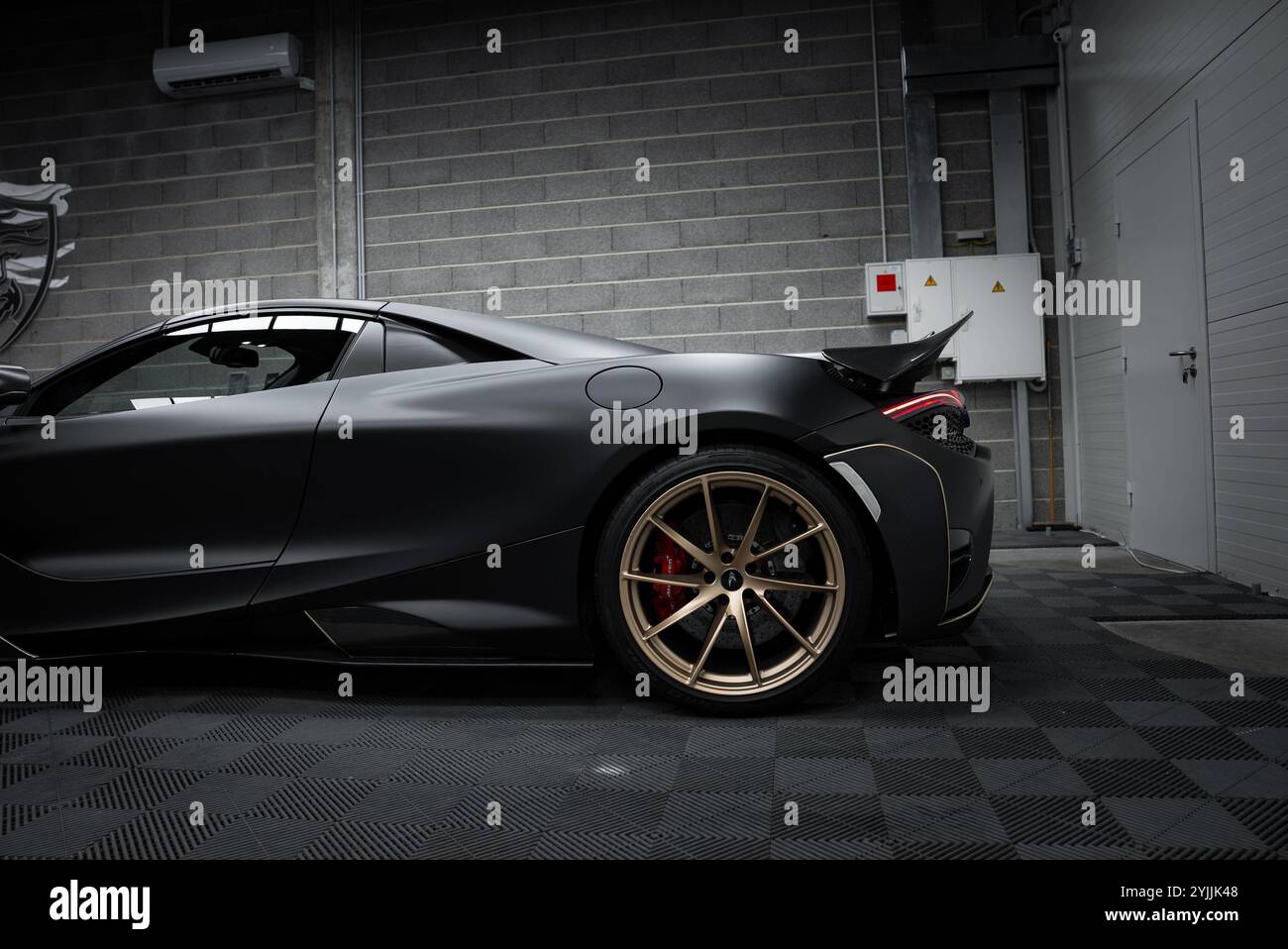 Close Up Side View of McLaren 720S in High End Garage Setting Stock ...