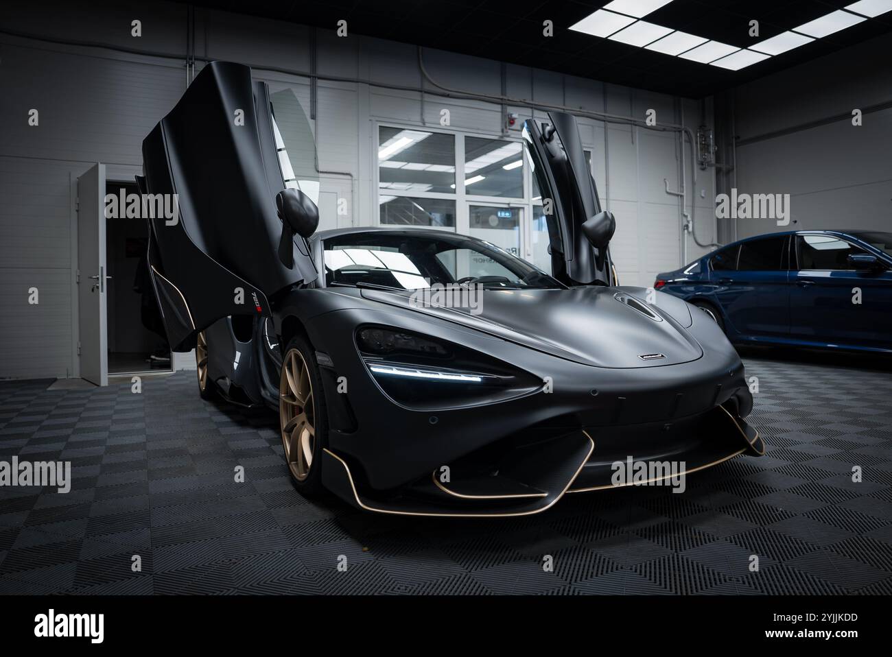 McLaren 720S with Dihedral Doors Open in Indoor Showroom Stock Photo ...