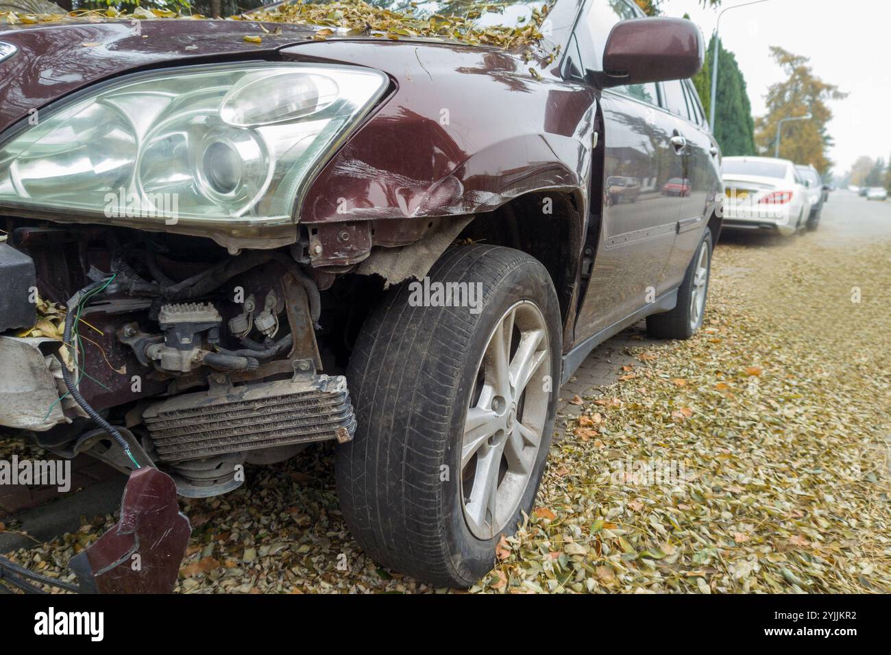 Damaged Car with Exposed Internal Parts Stock Photo - Alamy