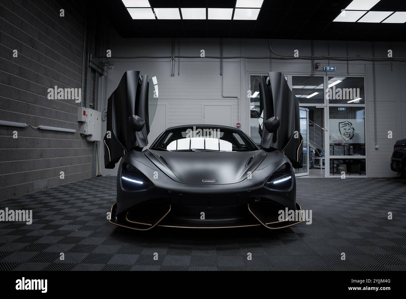 McLaren 720S with Dihedral Doors Open in Modern Showroom Stock Photo ...