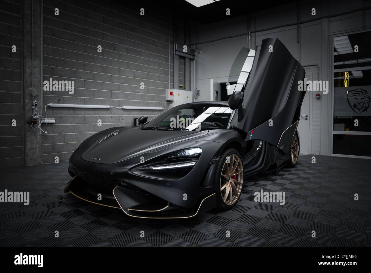 McLaren 720S with Dihedral Door Open in Luxury Showroom Stock Photo - Alamy