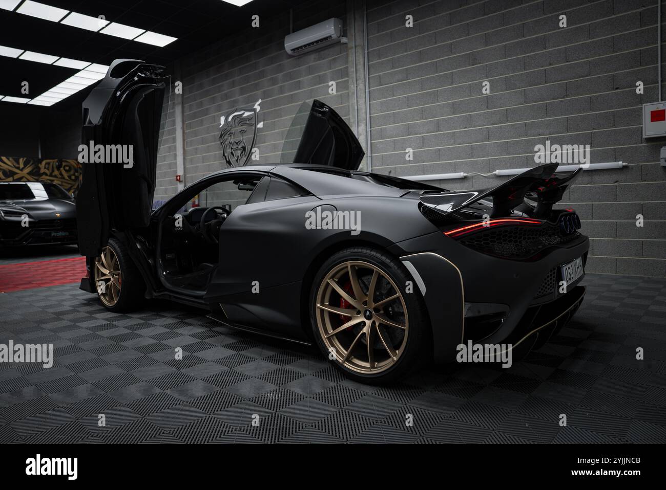 McLaren 720S with Dihedral Doors Open in Luxury Showroom Stock Photo ...