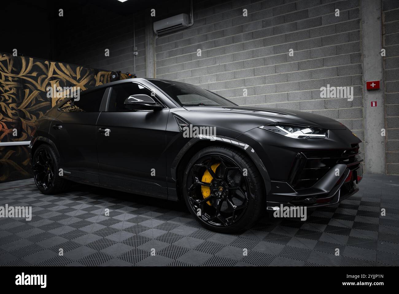 Matte Black Lamborghini Urus Performante in Modern Showroom Stock Photo ...