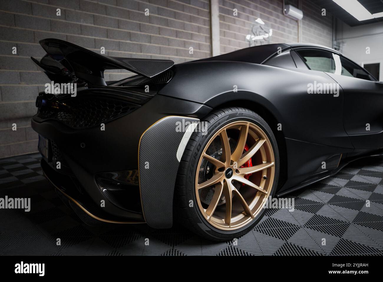 Close Up of McLaren 720S in Modern Garage with Checkered Floor Stock ...