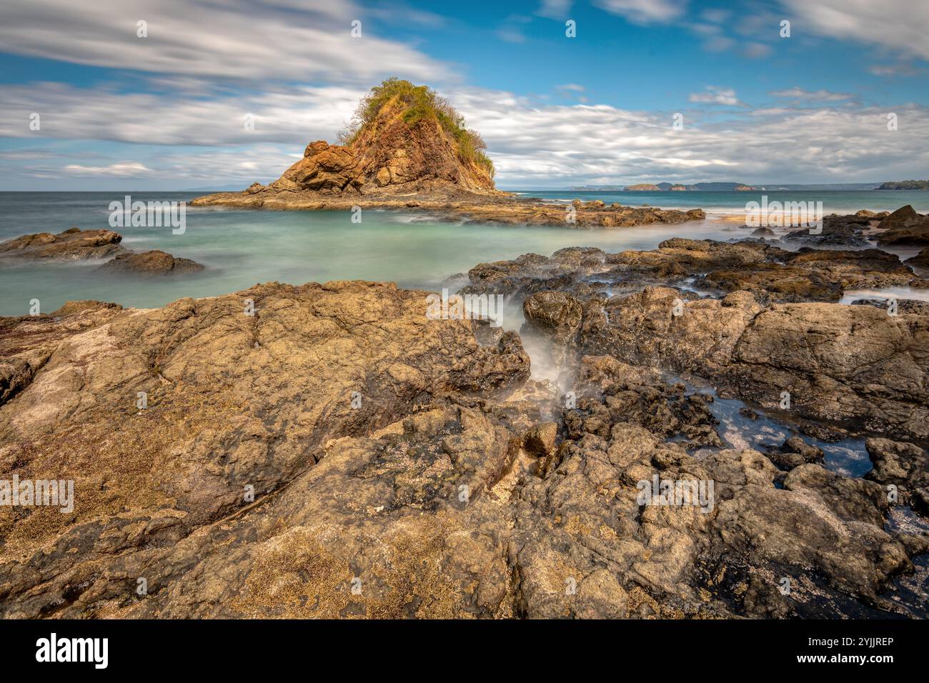 Long exposure, pacific ocean waves on rock in Playa Ocotal, El Coco ...