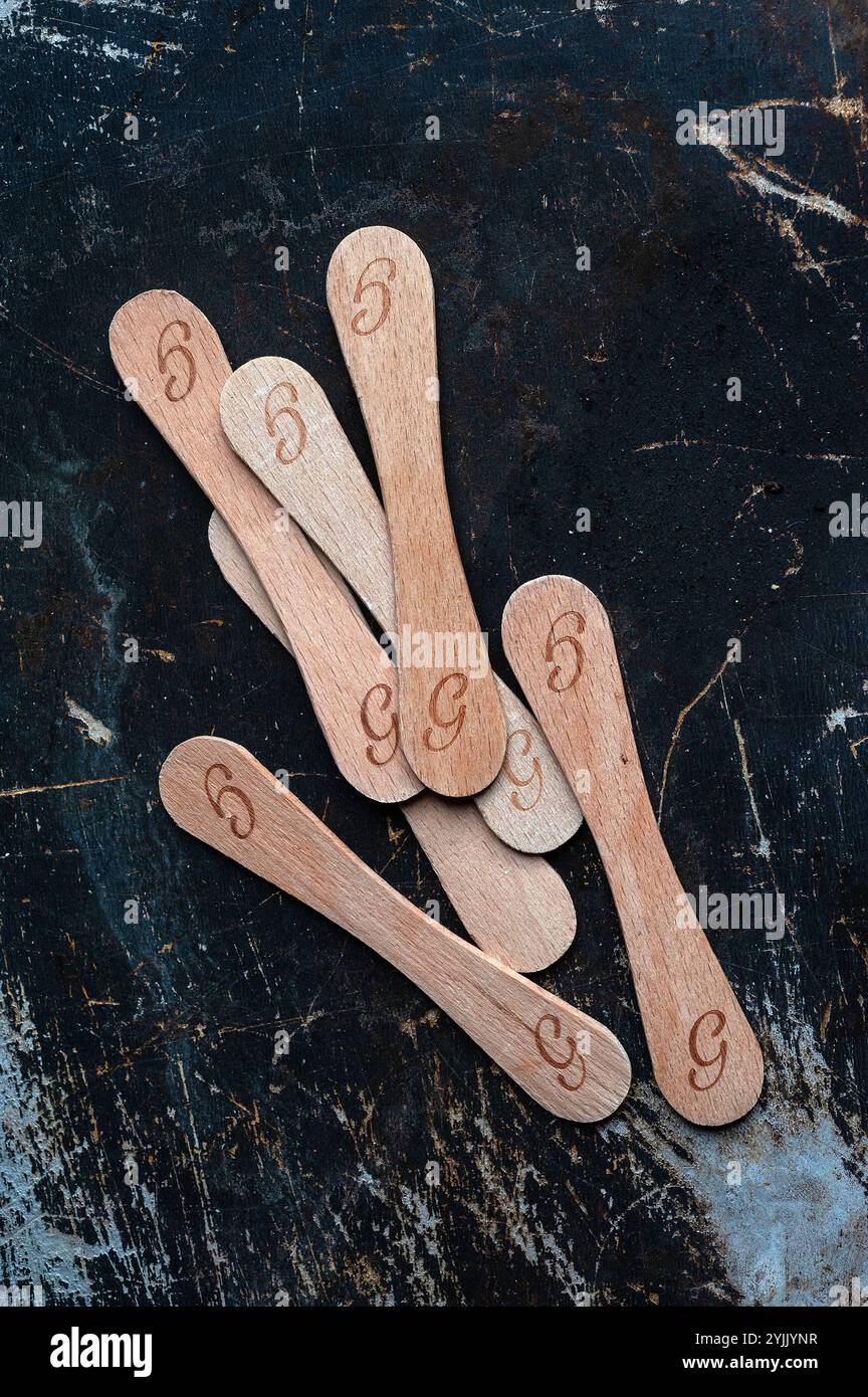 used wooden ice cream support sticks england Stock Photo - Alamy