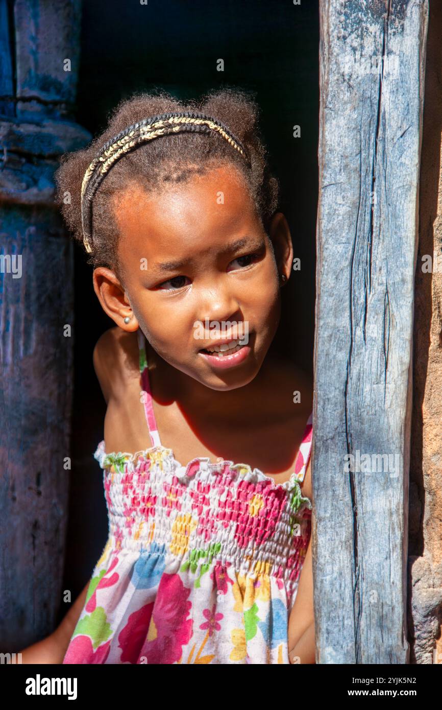 Village African Girl Curiosity Peeping At The Door Waiting For