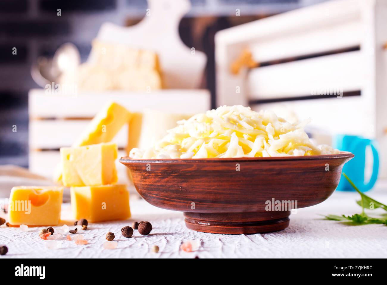 Shredded mozzarella and red cheddar cheese in bowl, mix cheeses Stock ...