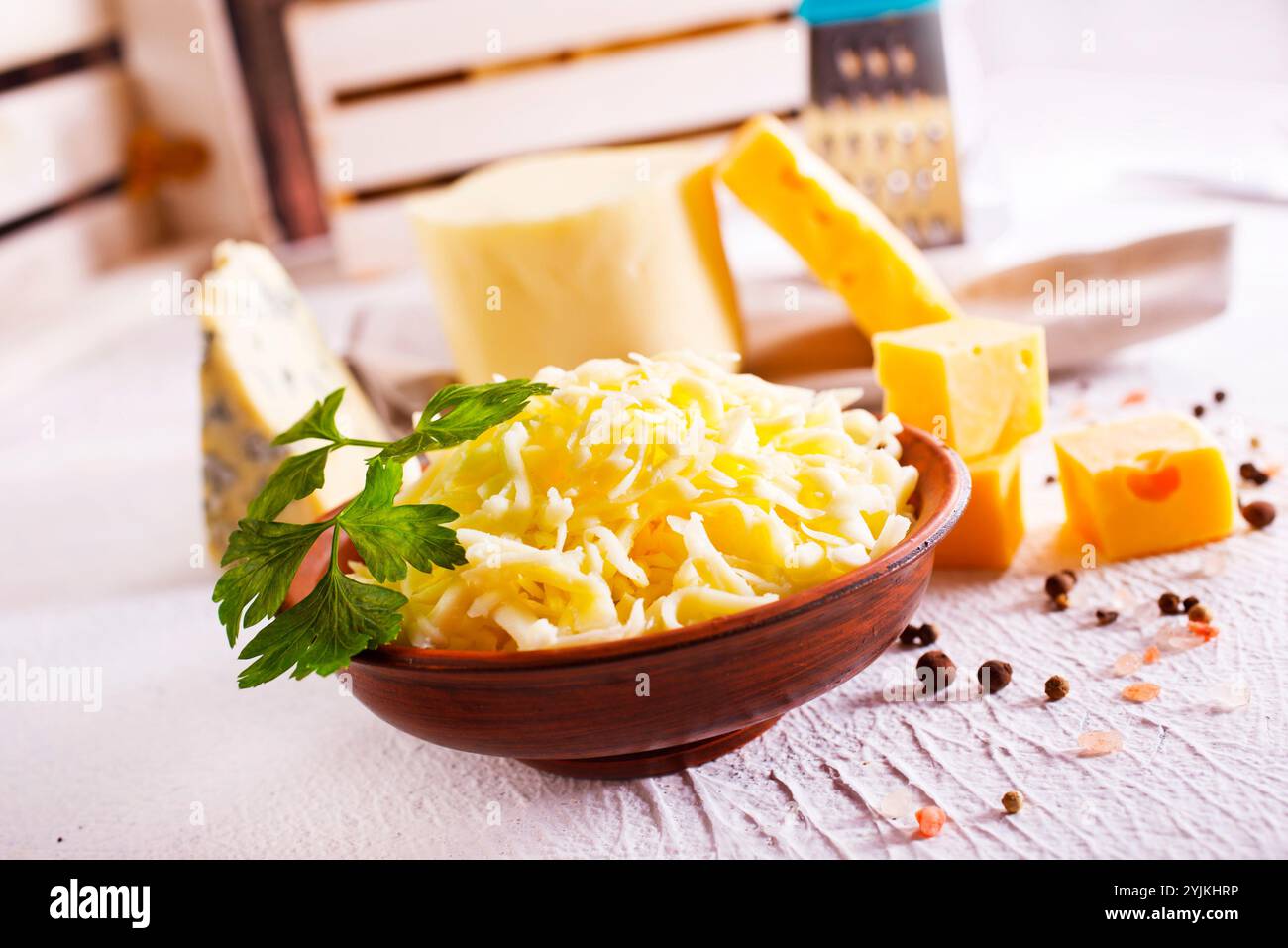 Shredded mozzarella and red cheddar cheese in bowl, mix cheeses Stock ...