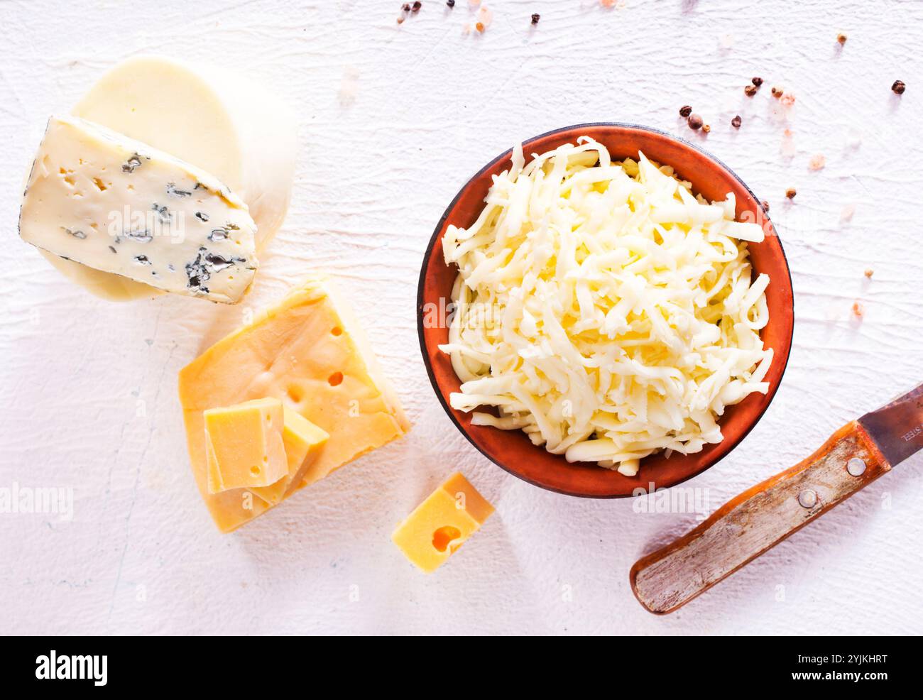 Shredded mozzarella and red cheddar cheese in bowl, mix cheeses Stock ...