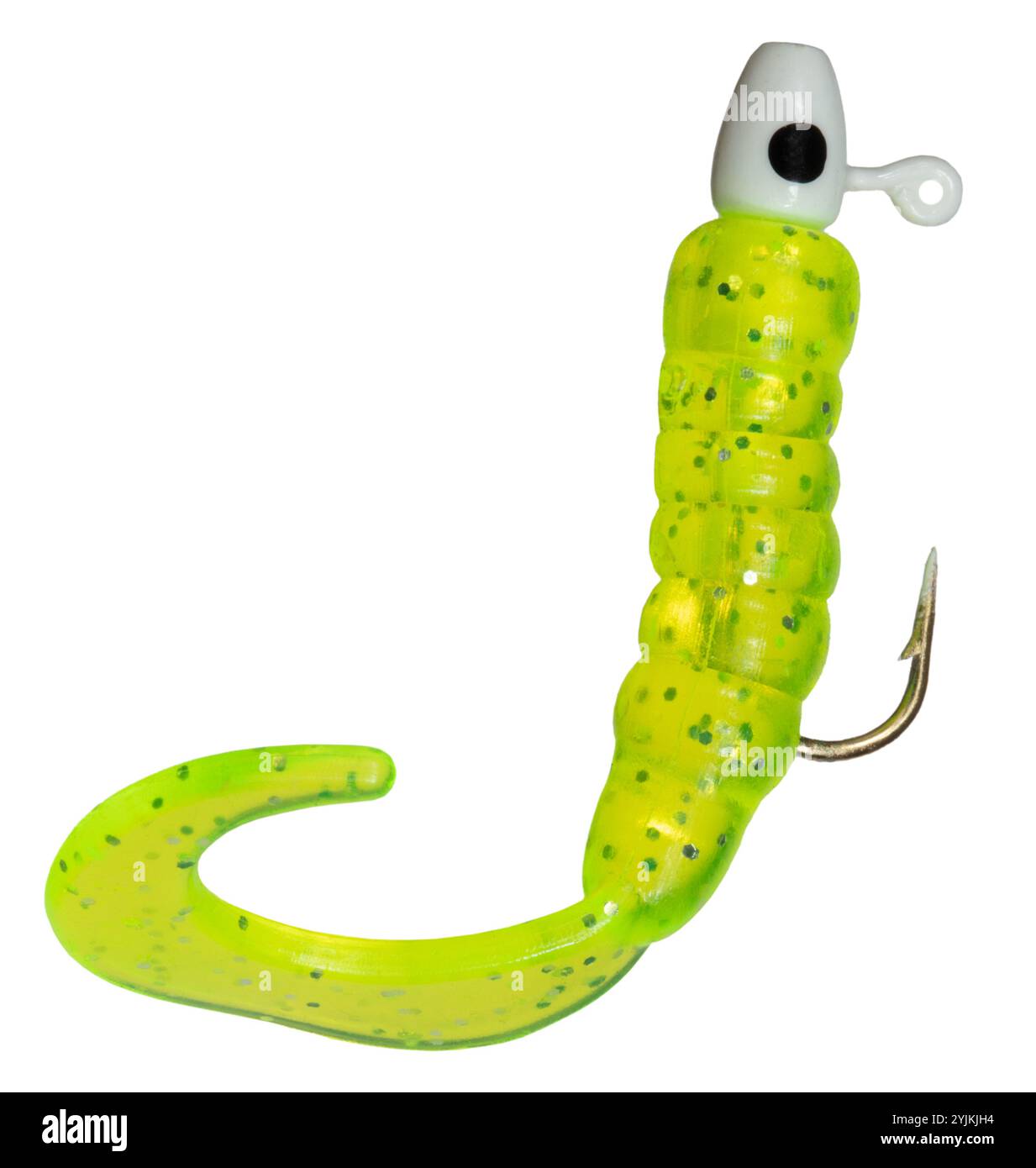 Transluscent curly tailed yellow fishing jig rigged with a hook and ...