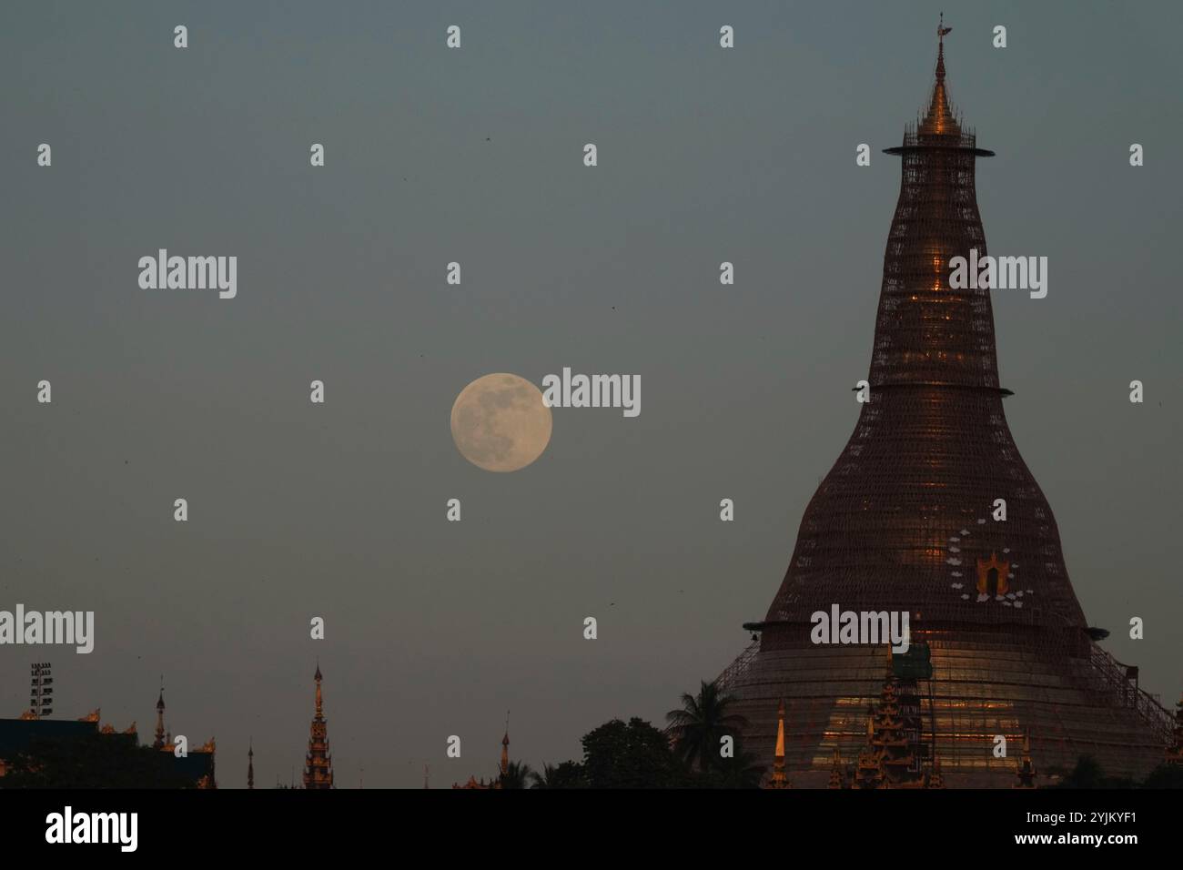 The supermoon rise near Myanmar Landmark Shwedagon during the full moon day of Tazaungmone, also ...