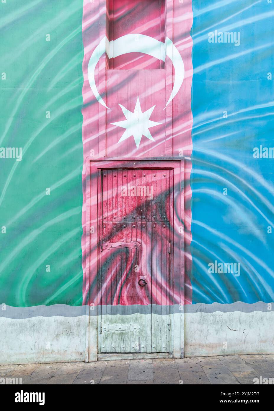 Vibrant mural in Baku showcases the national flag of Azerbaijan with ...