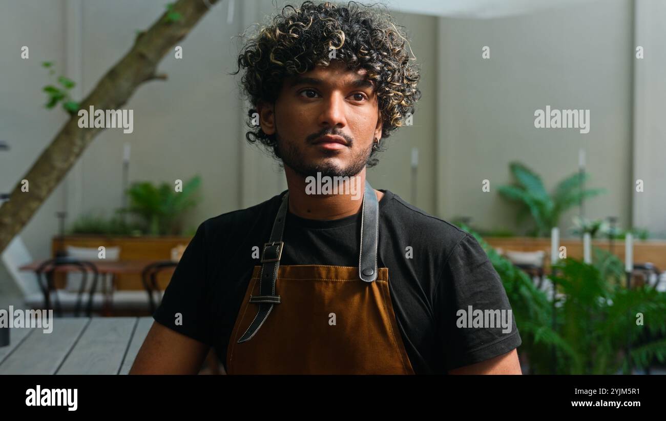 Happy joyful Latino American ethnic man male smiling cafe worker in ...