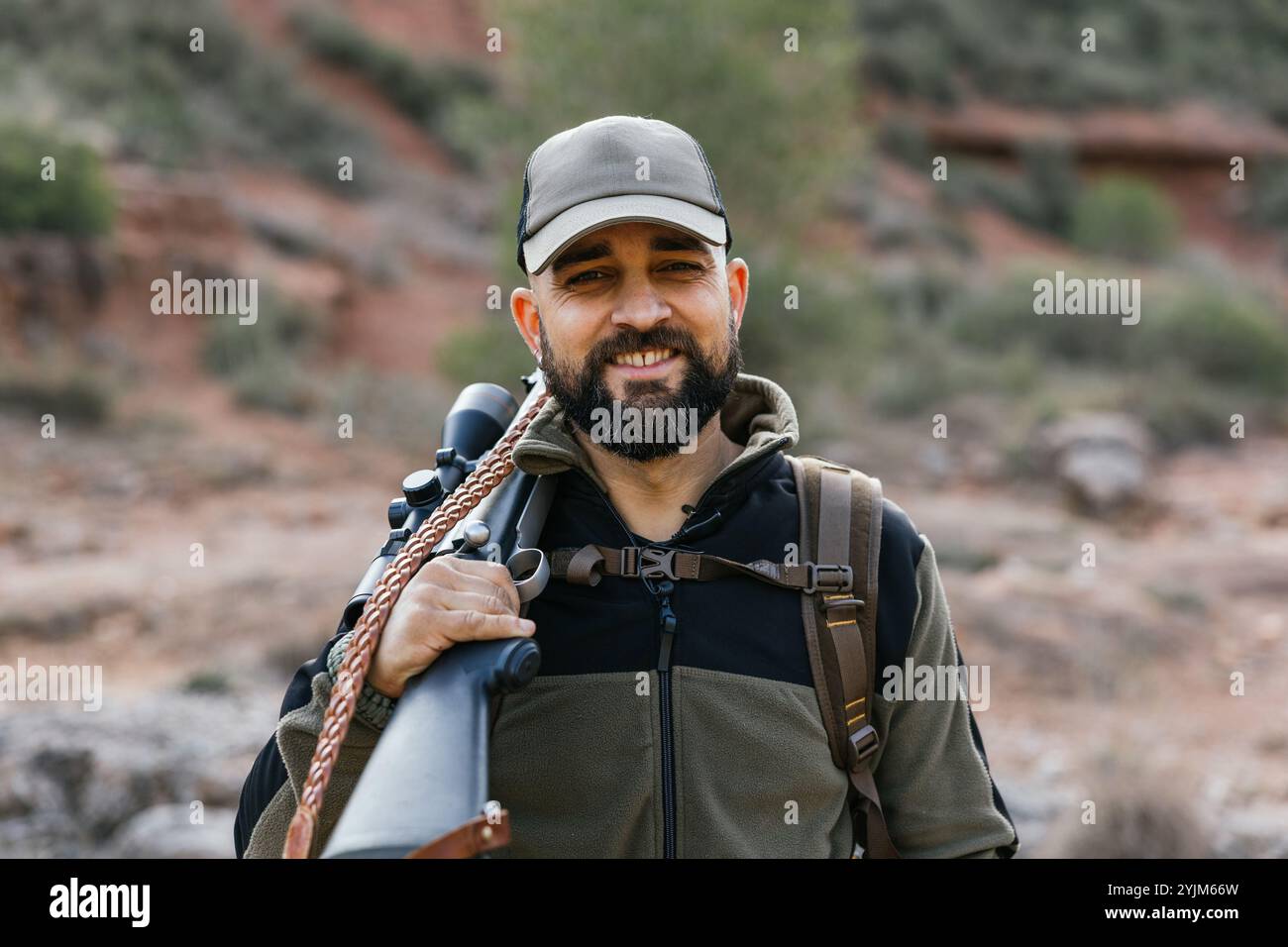 Holding gun on shoulder hi-res stock photography and images - Alamy