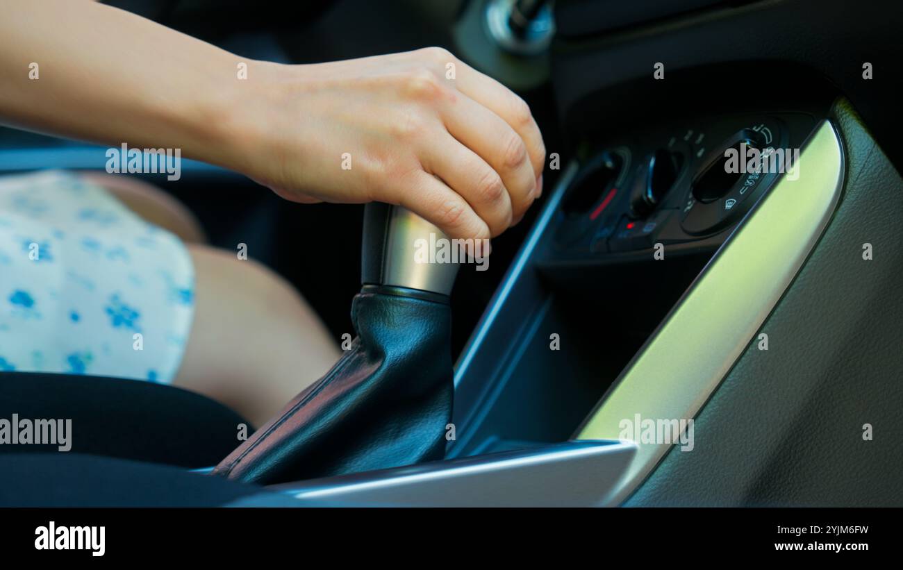 Unrecognizable woman touching electric car hi-res stock photography and ...