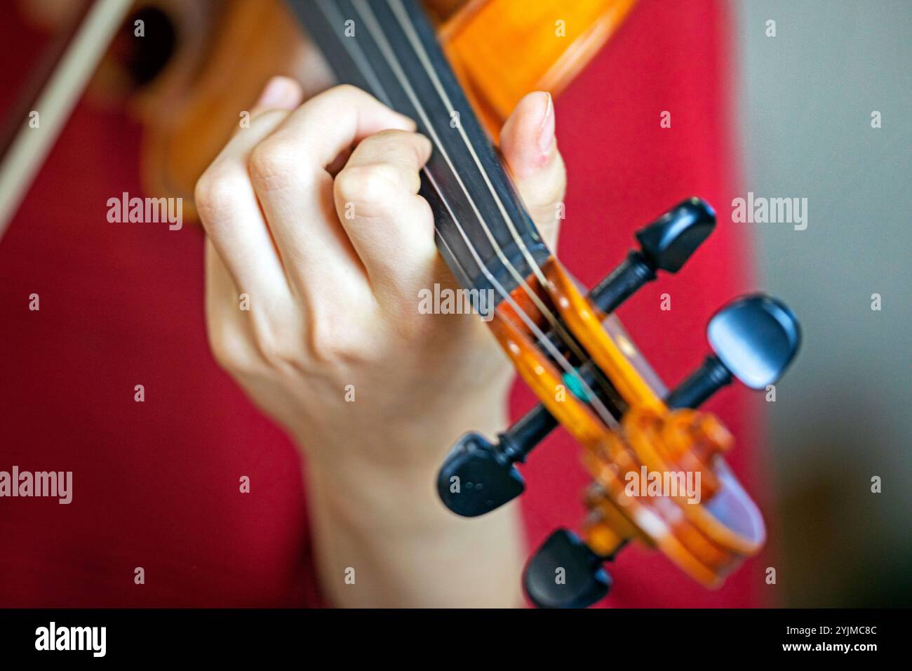 play the violin with the left hand. Correct positioning of the hand and ...