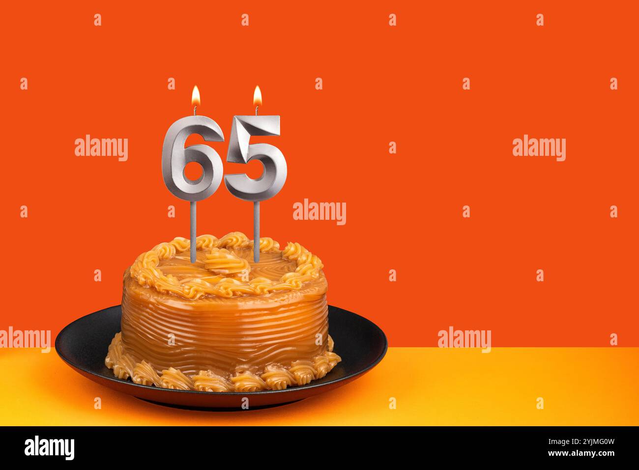 Birthday candle number 65 - Cake with dulce de leche frosting Stock ...