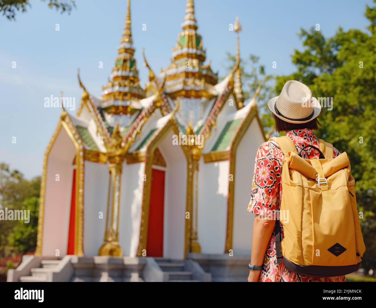 Travel to Thailand. Young female tourist explores modern Buddhist ...