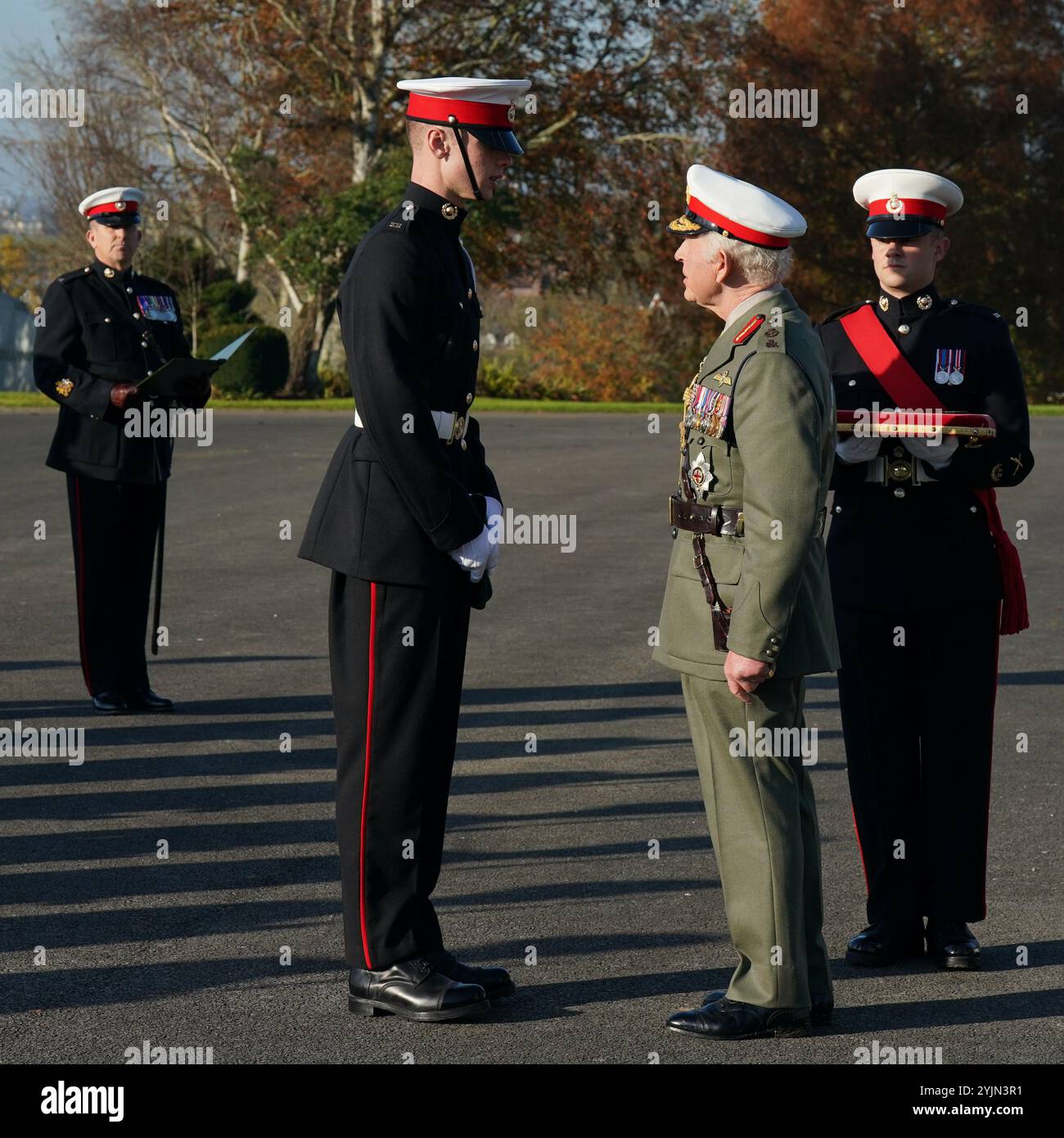 King Charles III, as Captain General Royal Marines, awards Marine ...