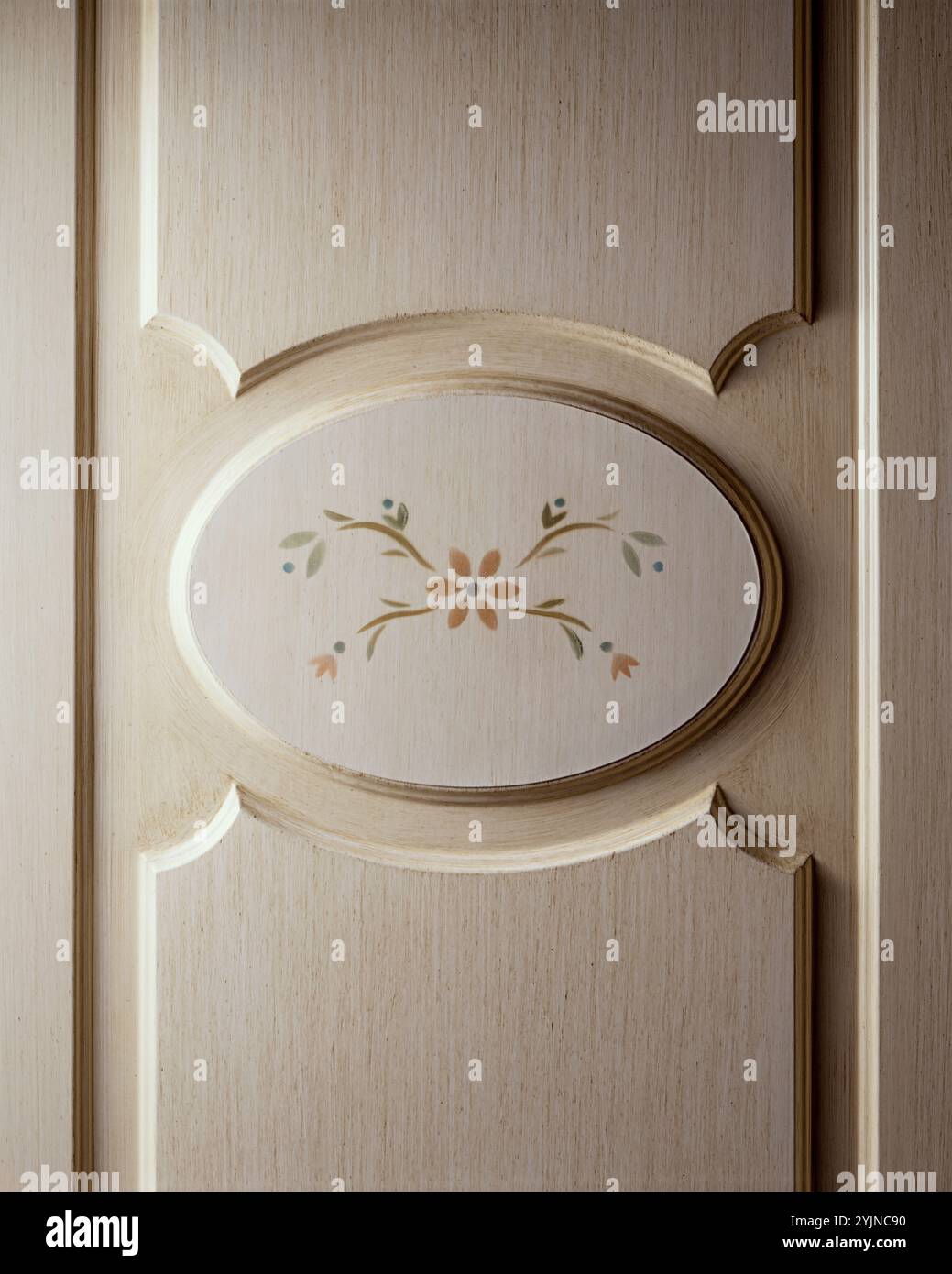 Texture of a flower-shaped inlay, on the wooden door of a white cabinet ...