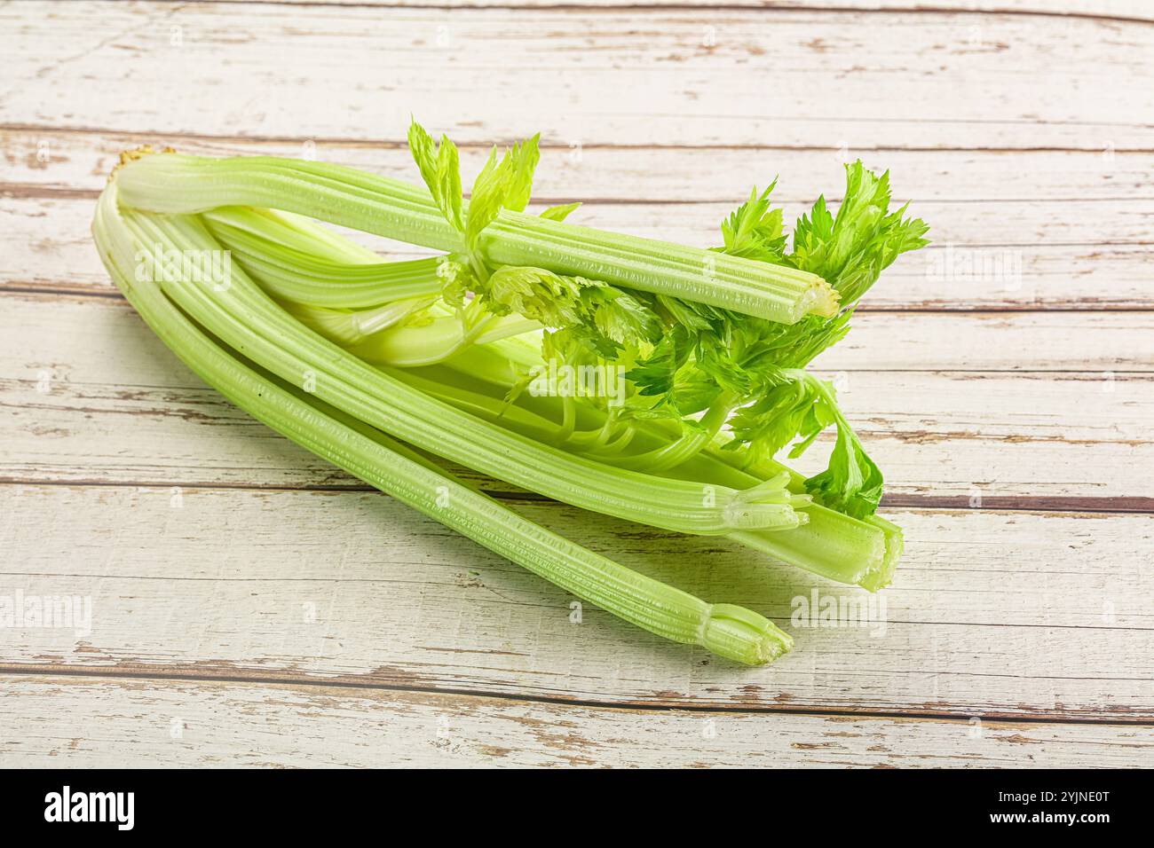 Vegan cuisine - raw green celery stem Stock Photo - Alamy