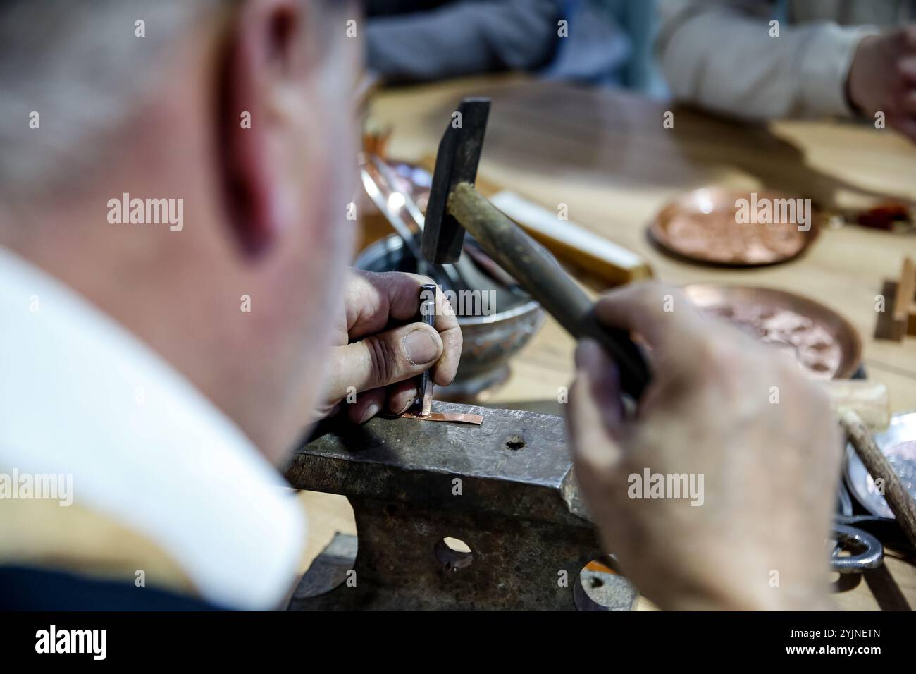 Baku, Azerbaijan. 15th Nov, 2024. Native Azeri man present copper ...