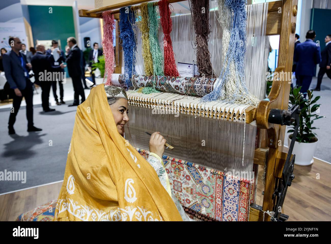 Native Azeri woman present carmet making technique, a part of Azeri ...