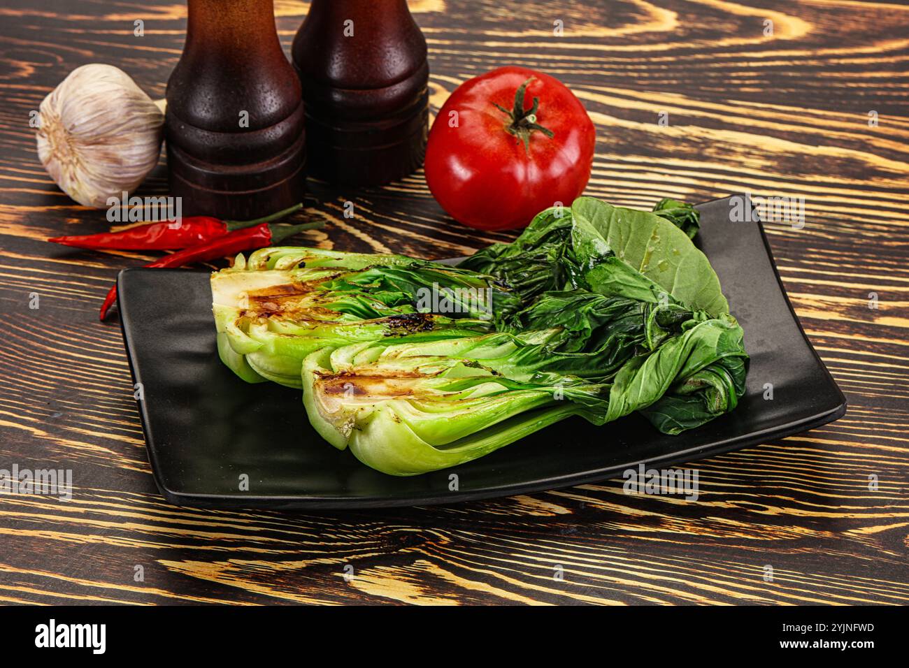 Asian grilled Pak Choy salad snack Stock Photo - Alamy