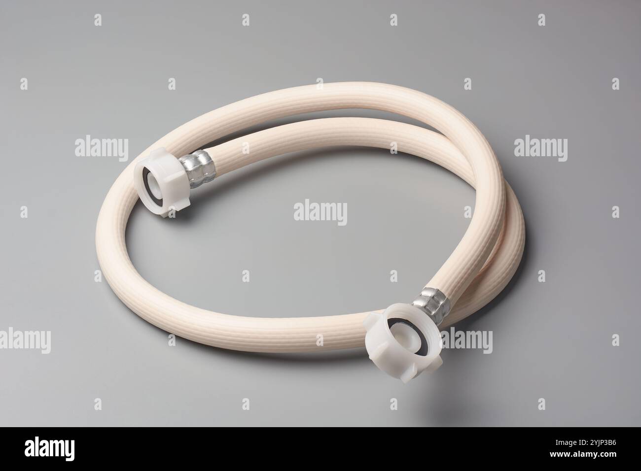 flexible inlet hose of washing machine isolated neutral gray background ...