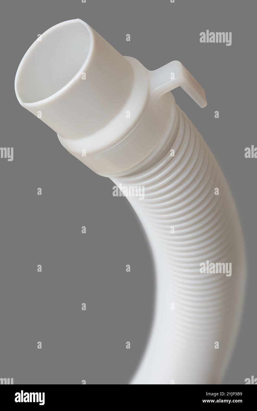 close-up of flexible drain hose or pipe of washing machine isolated ...