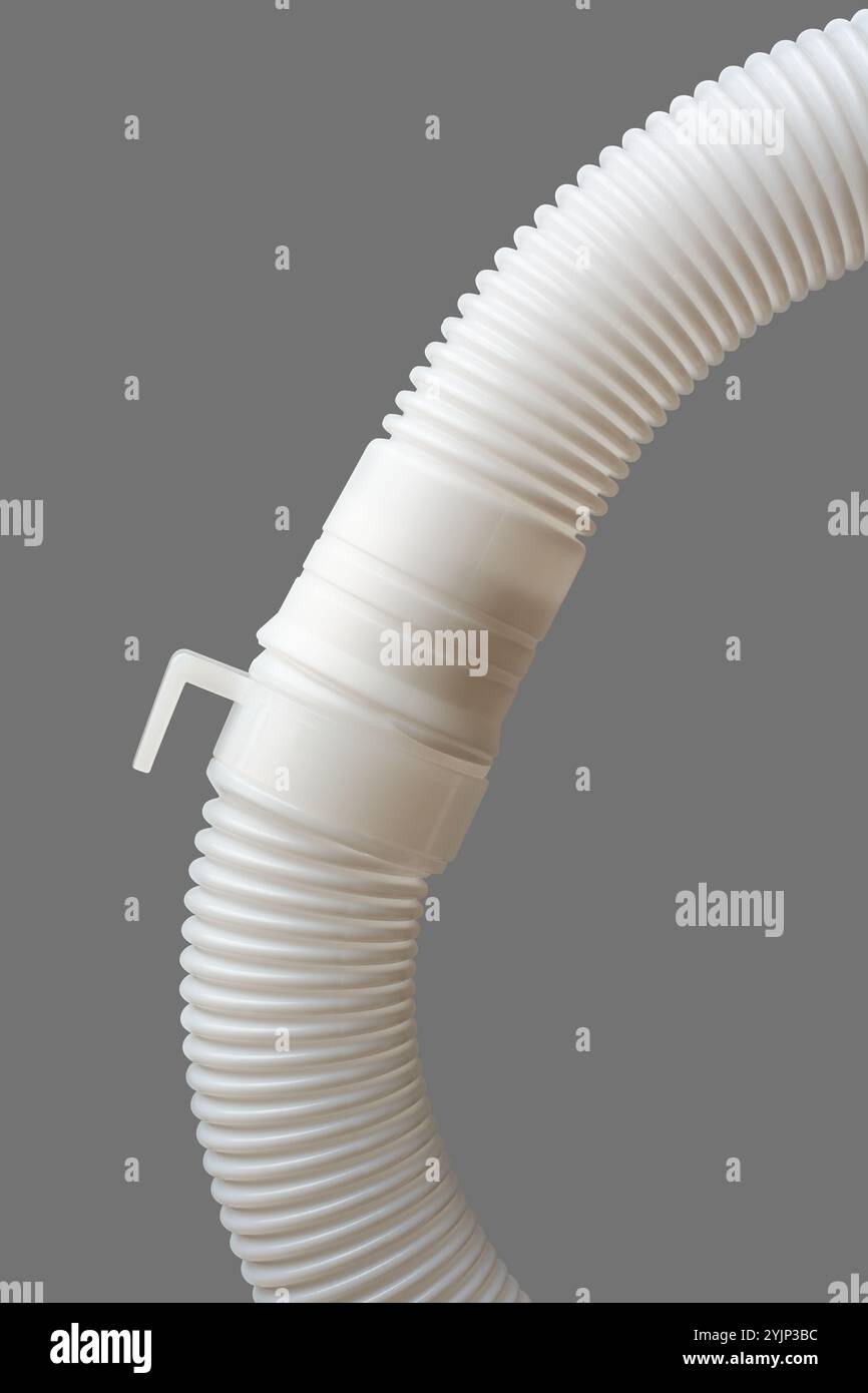 close-up of flexible drain hose or pipe connection isolated gray ...
