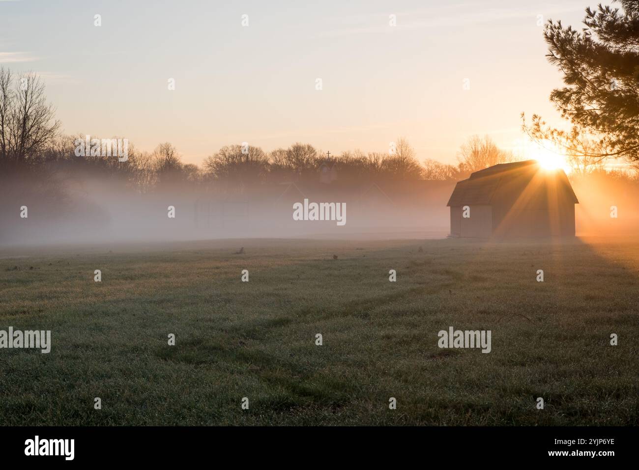 sunrise over barn Stock Photo - Alamy