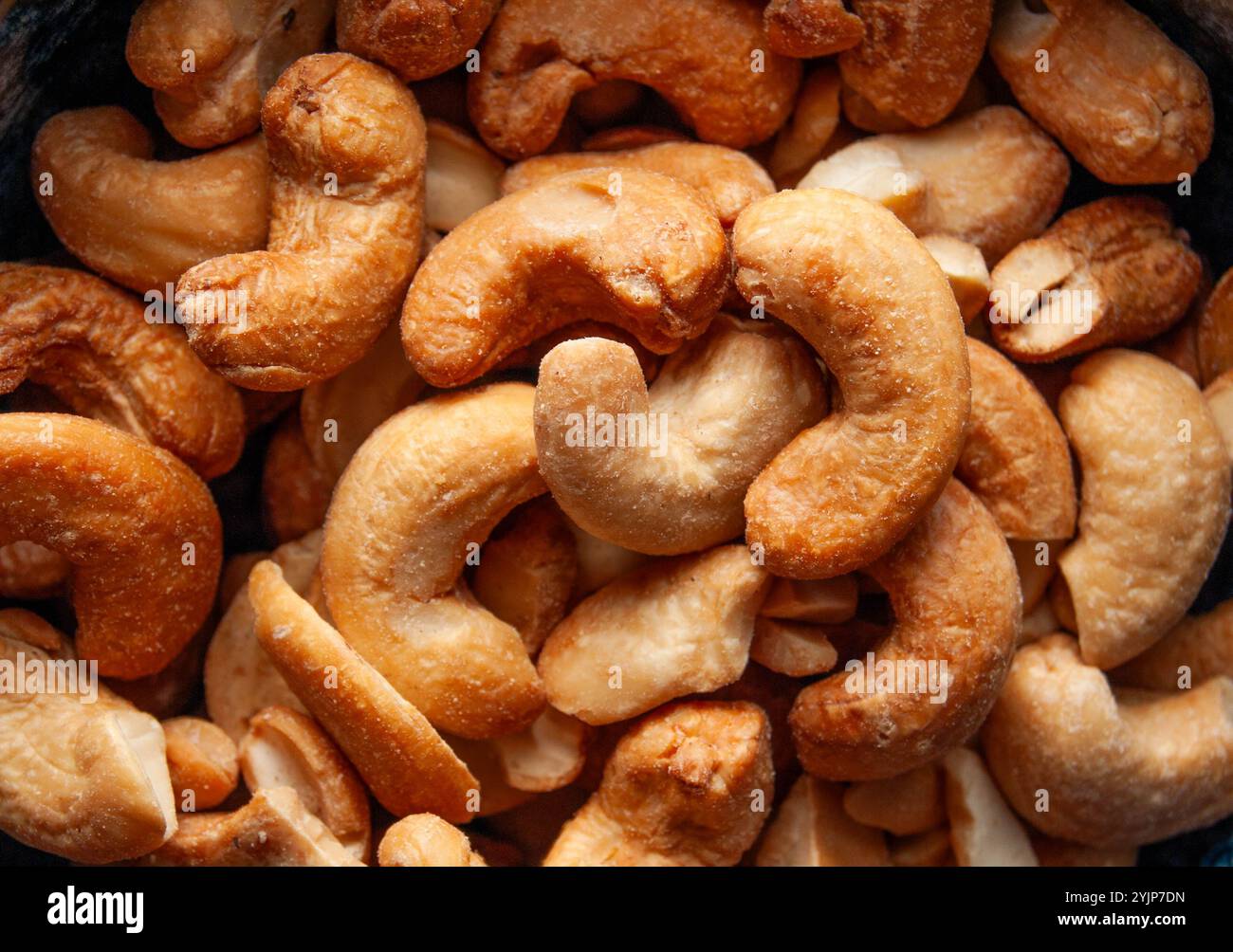 Fresh and crunchy cashews captured up close, ideal for nutrition and ...