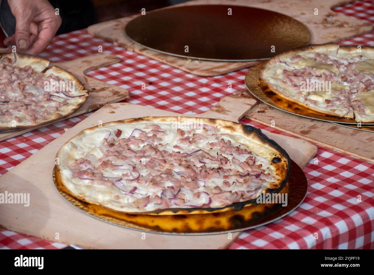 Traditional food of Alsace, flammekuche wood oven baked tarte with ...