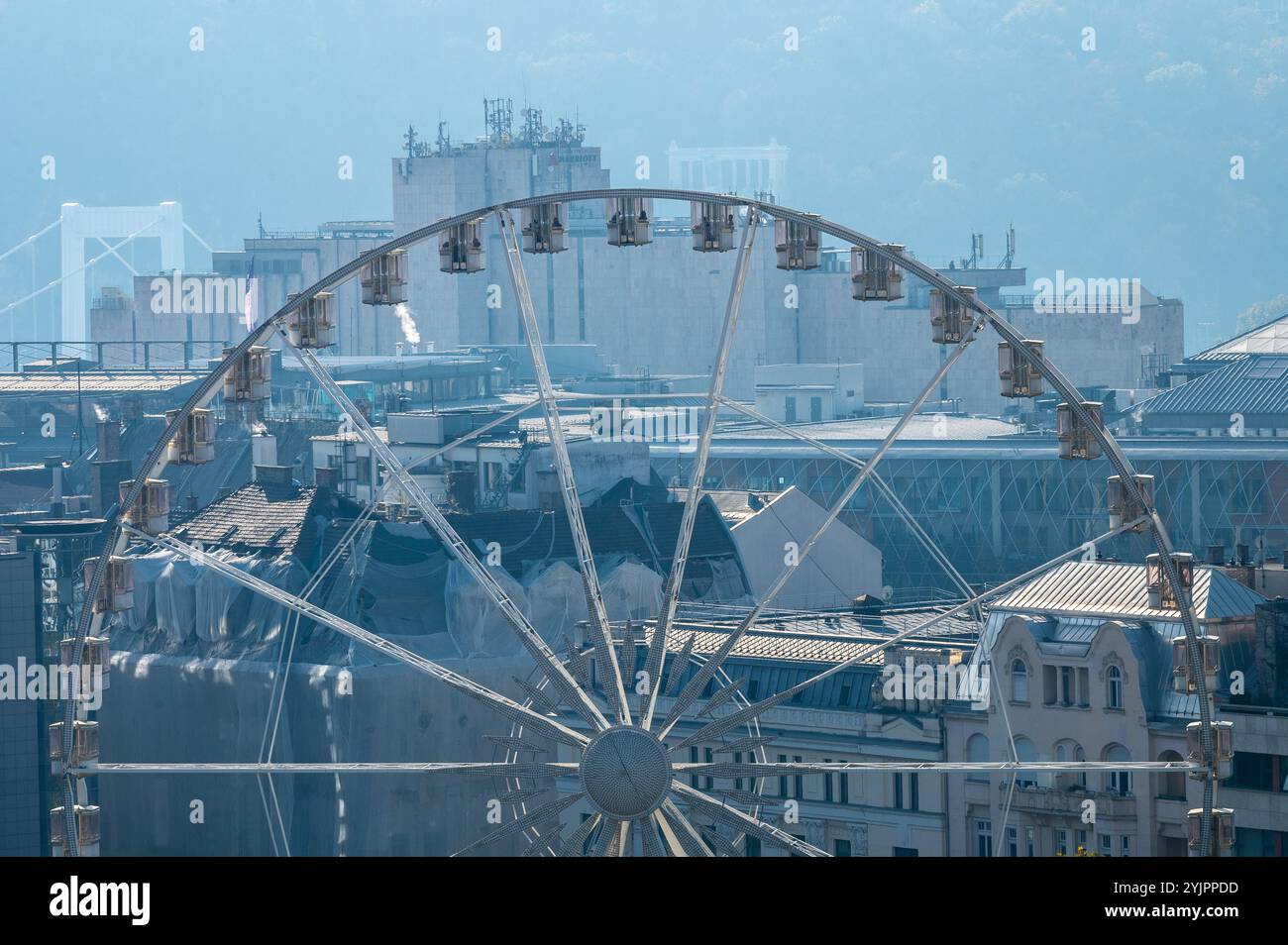 View of the Ferris wheel of Budapest from the top of the St. Stephen's ...