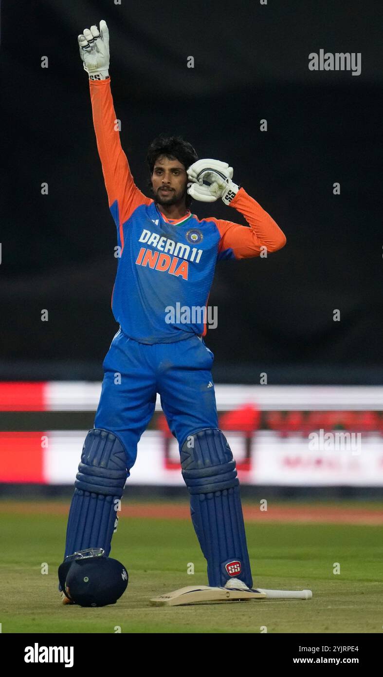 India's Tilak Varma celebrates after scoring a century during the ...